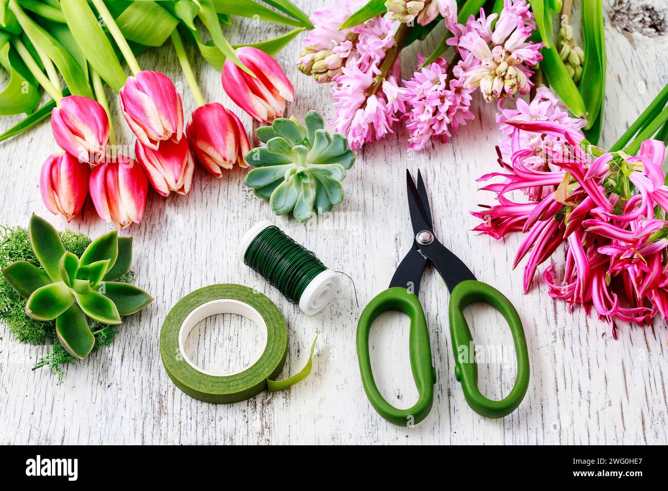 Florist workplace: flowers and accessories. Hobby time Stock Photo - Alamy
