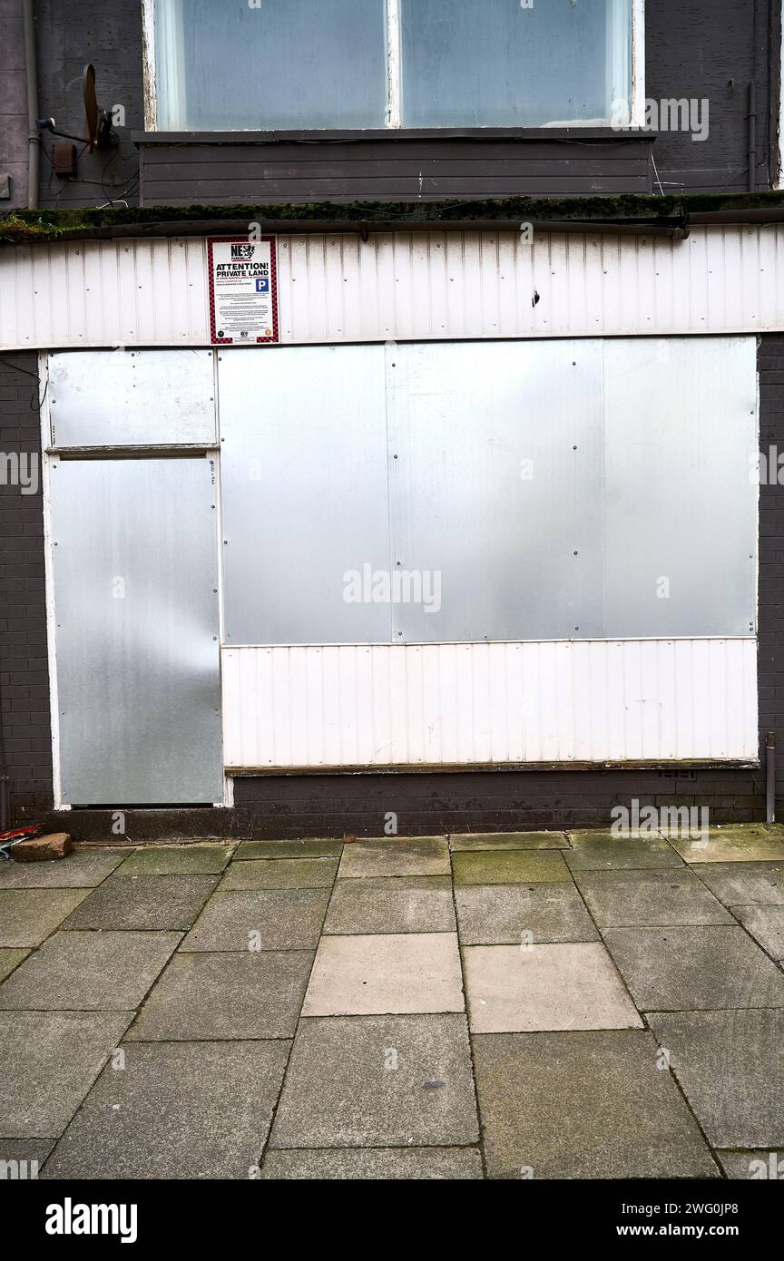 Boarded up shop premises in Blackpool UK Stock Photo - Alamy