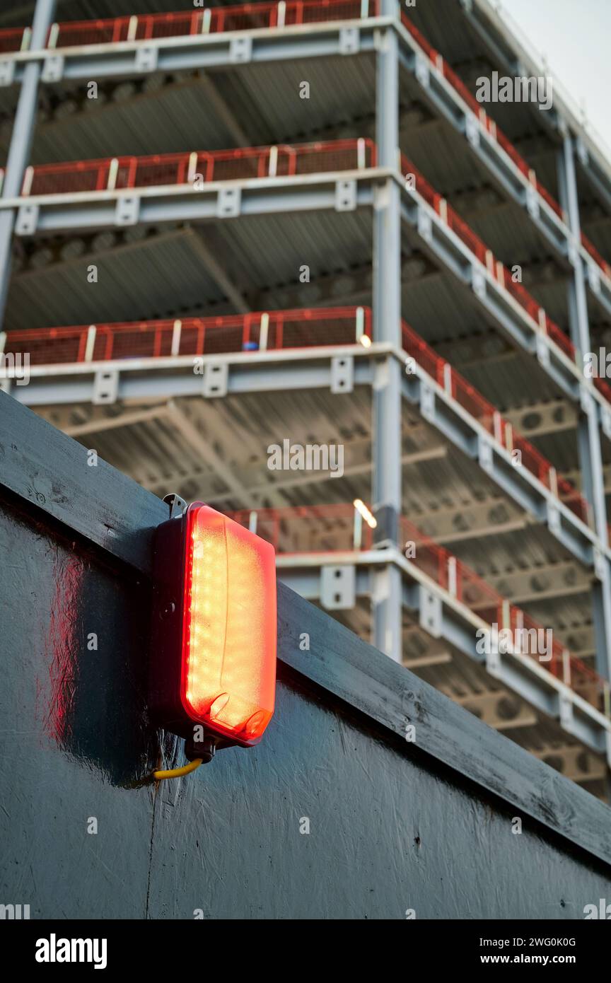 Security light on temporary wall around construction site Stock Photo ...