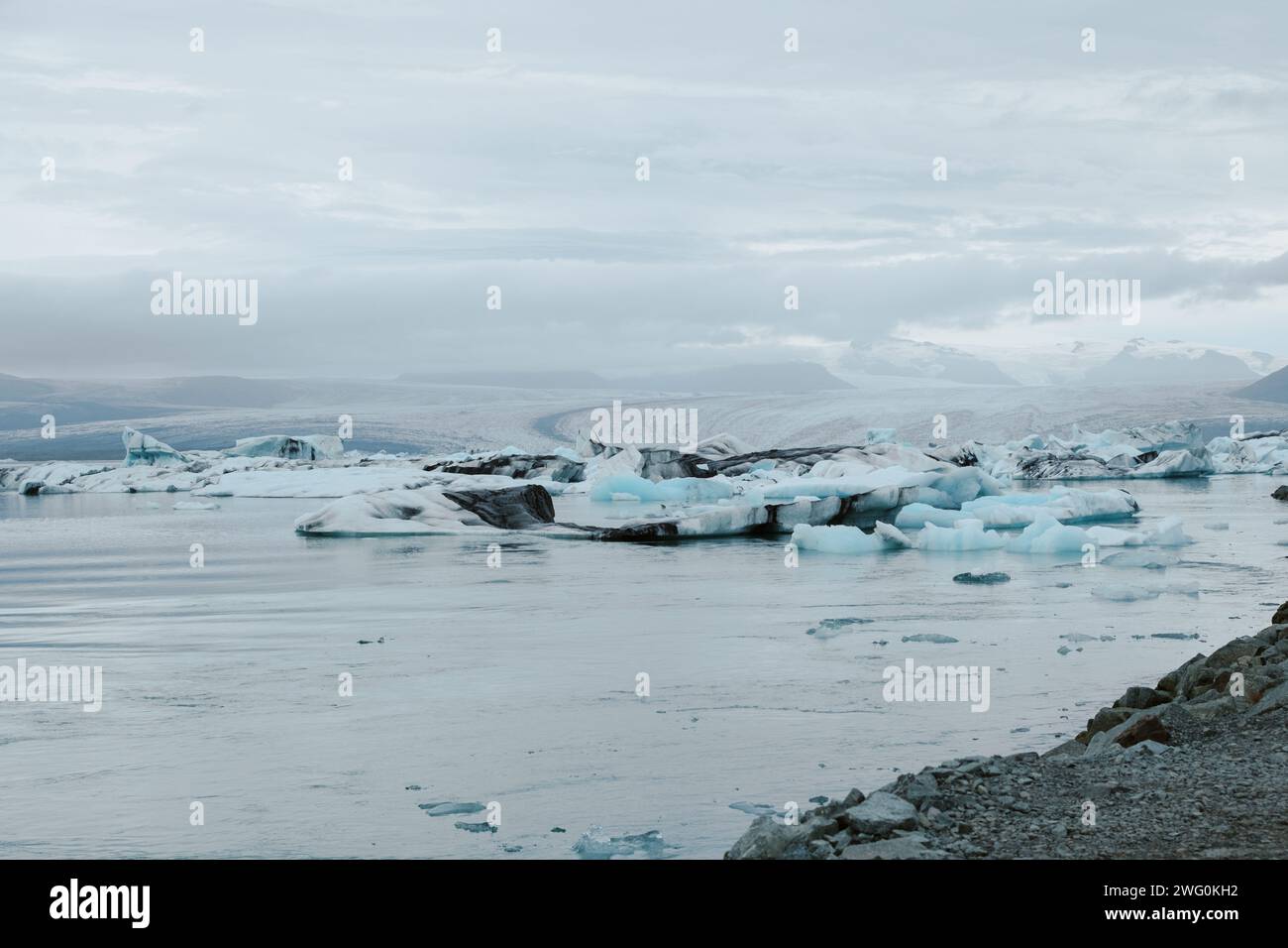 Iceland geographic background black sand and isolated glacier lagoon ...