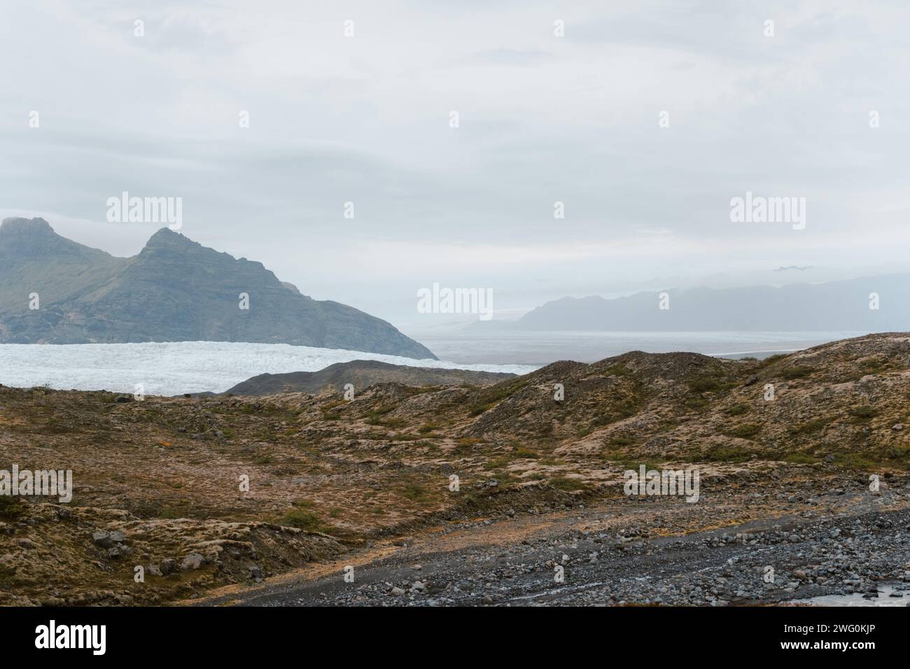 Textured background of isolated Icelandic glacier and mountainside ...