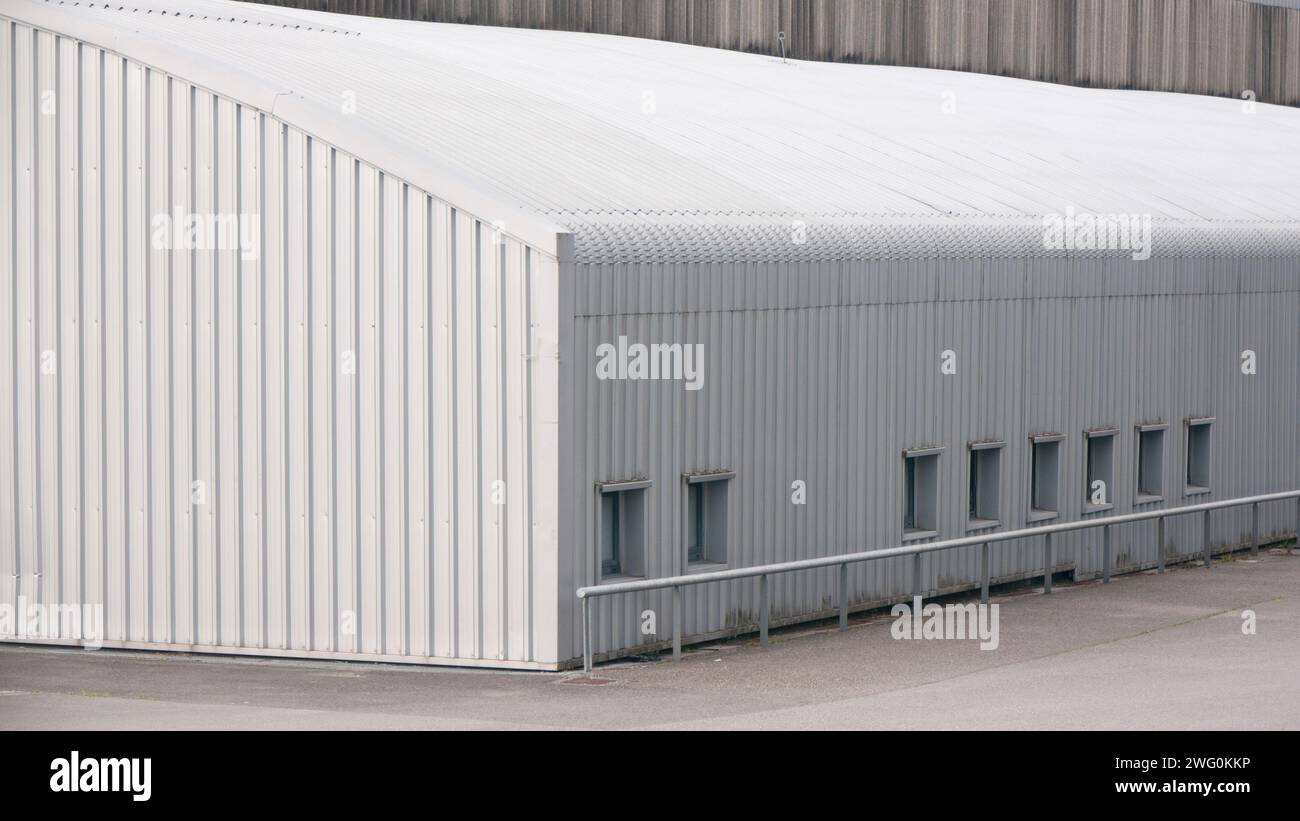 Metallic round warehouse Stock Photo - Alamy