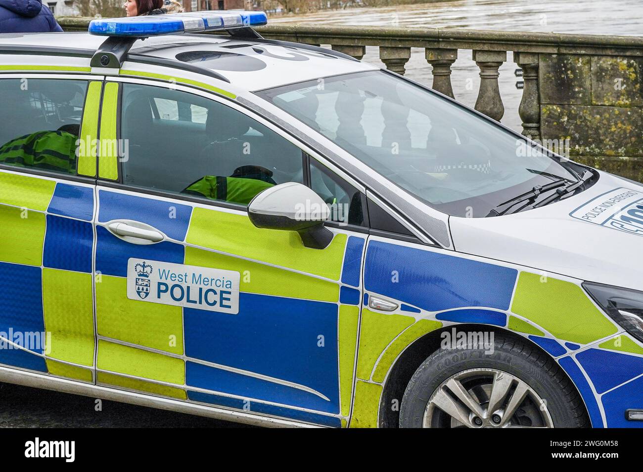 Close, offside, side view of a West Mercia Police car parked outdoors ...