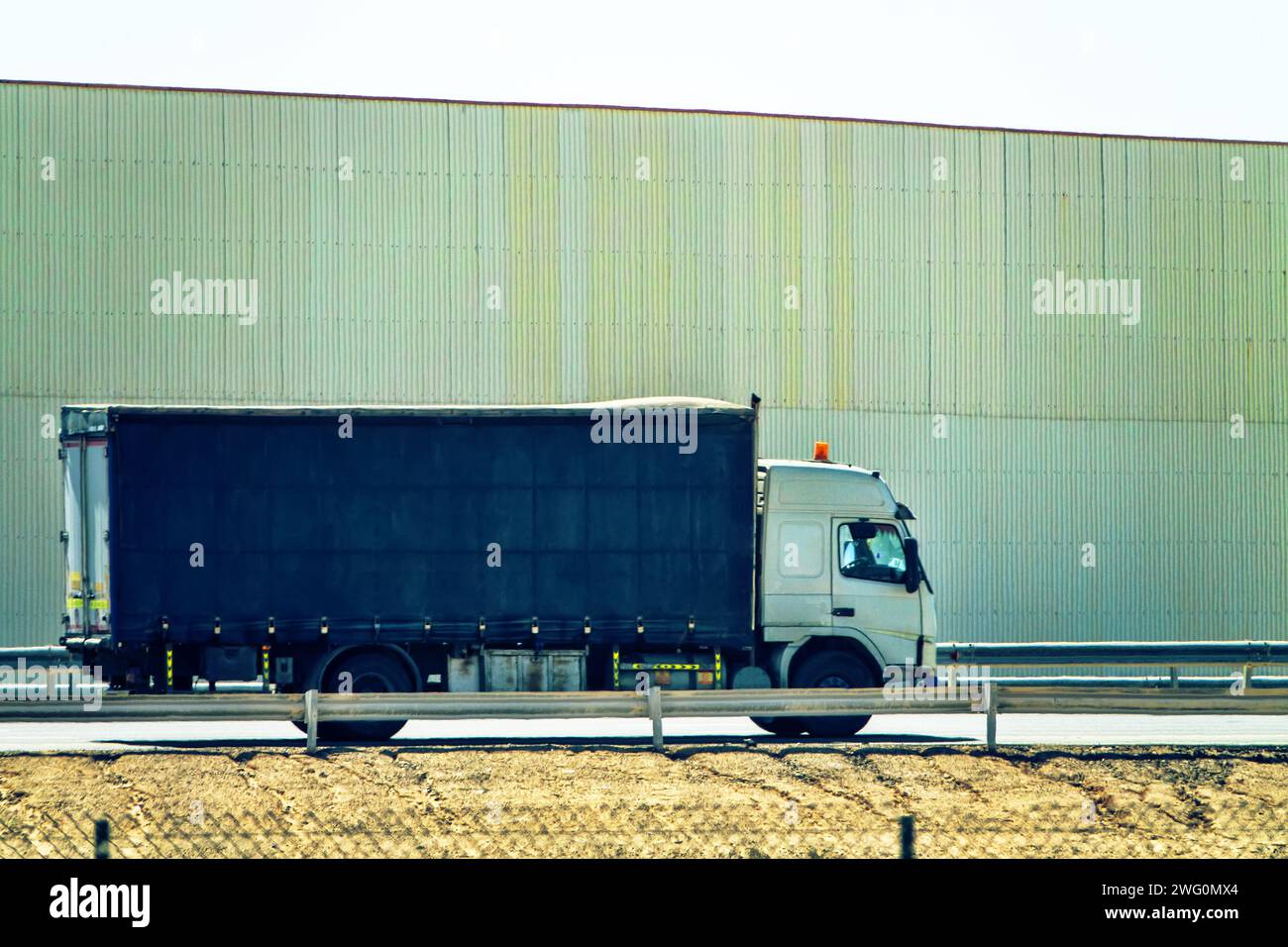 Protective wall on the highway protects from dust and noise (noise ...