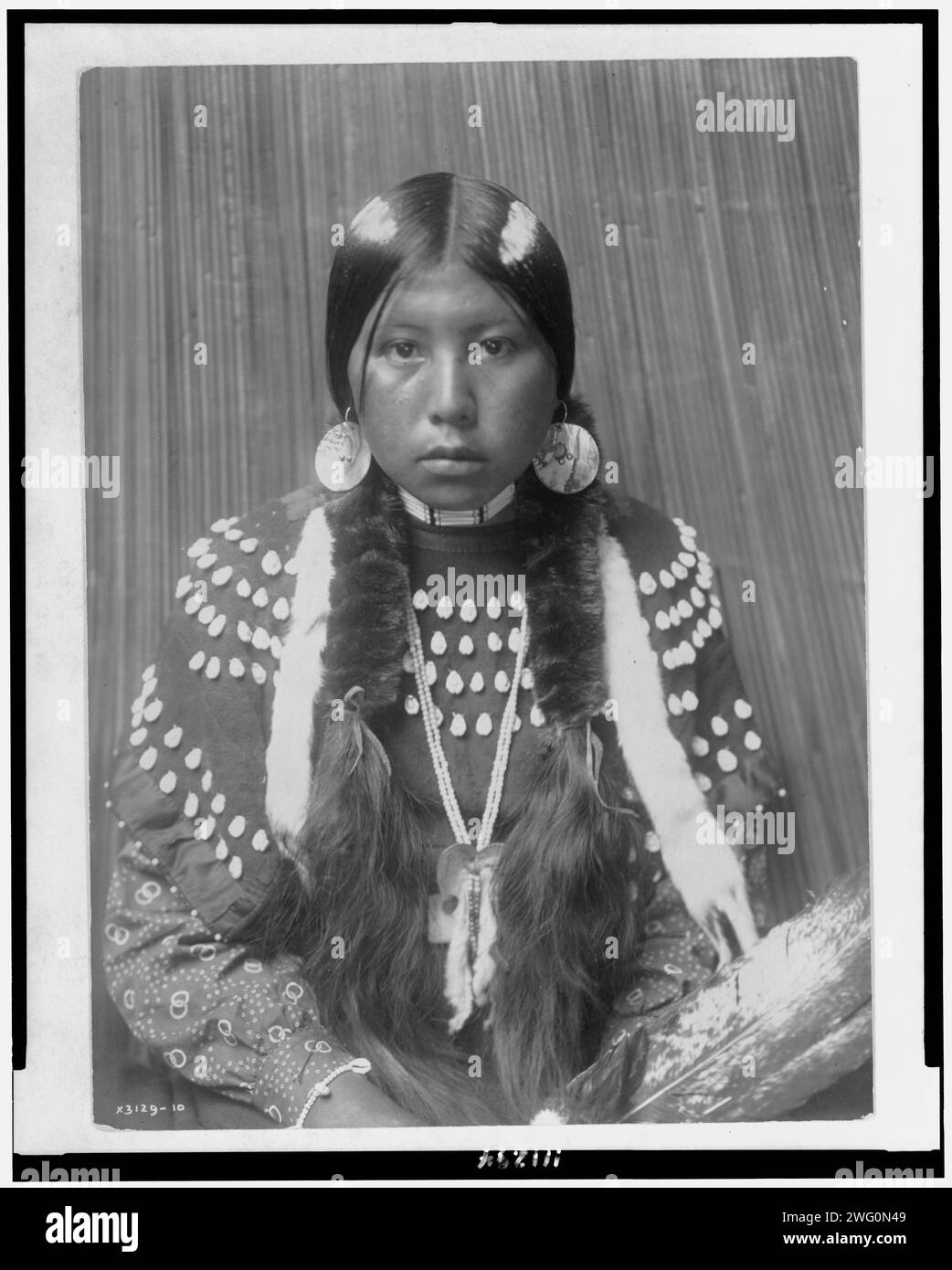Dusty Dress, c1910. Kalispel Indian woman, half-length portrait, facing ...
