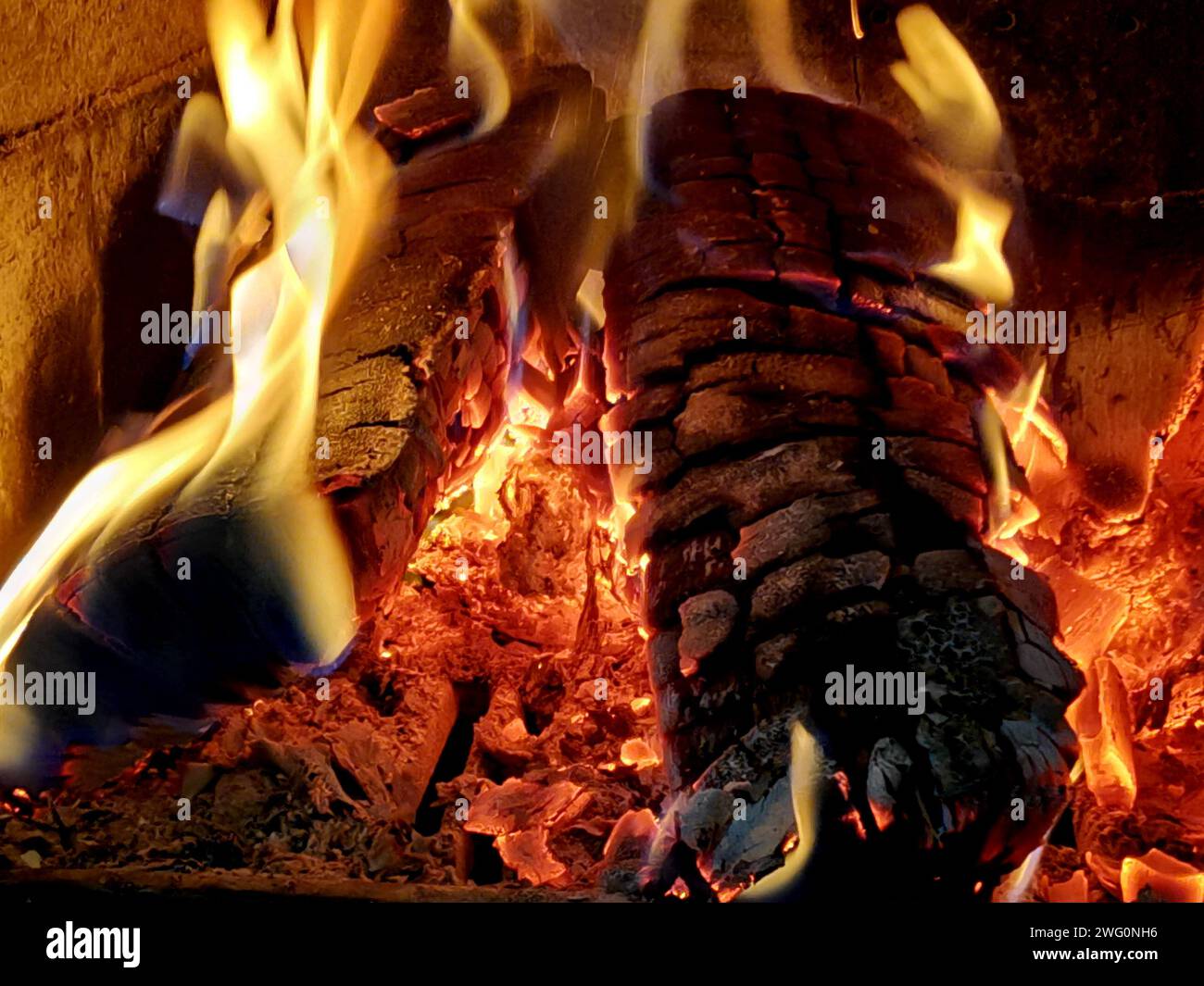 Burning fire with fiery flames and glowing coal in a stove Stock Photo ...