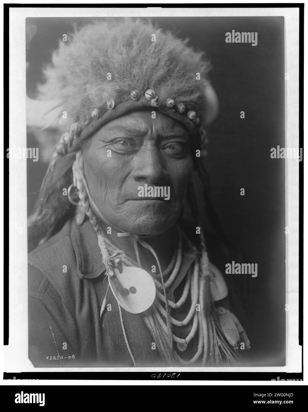 One Blue Bead, c1908. One Blue Bead, head-and-shoulders portrait, facing front Stock Photo - Alamy