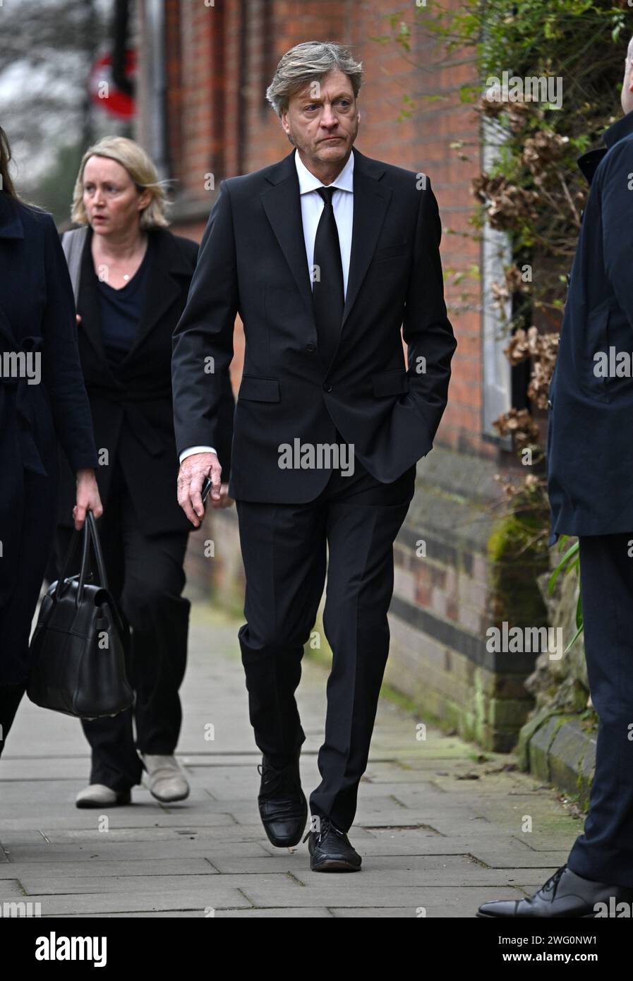 London, UK. February 2nd, 2024. Richard Madeley at the funeral of Derek ...