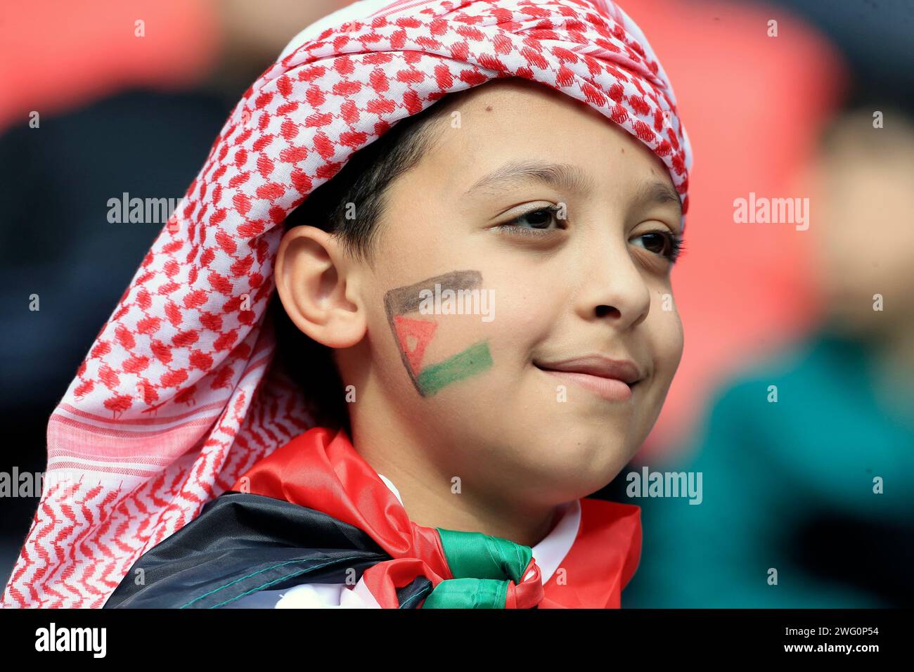 A Jordanian fan attends the quarterfinal soccer match between ...