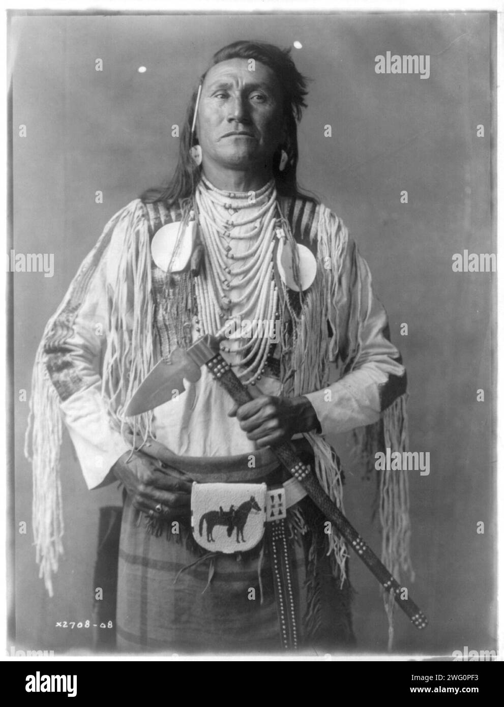 Indian holding tomahawk Black and White Stock Photos & Images - Alamy