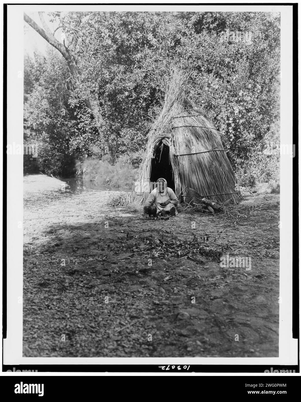 Cooking acorns-upper Lake Pomo, c1924. Pomo Indian woman cooking in ...