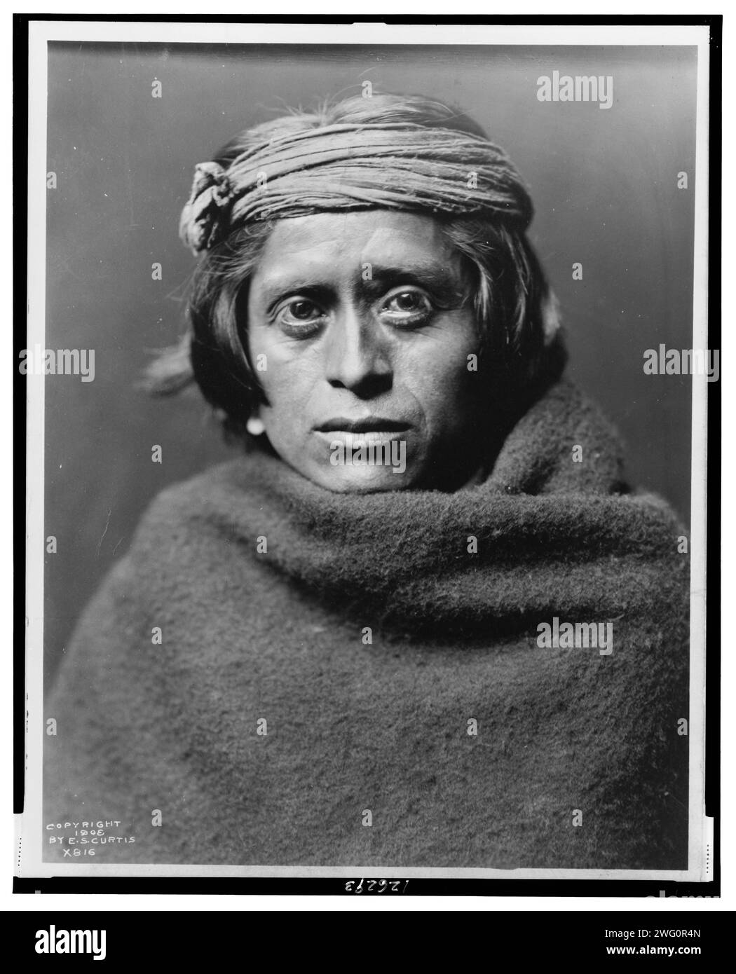 A Zuni man, c1903. Zuni man wearing ragged headband and blanket Stock ...
