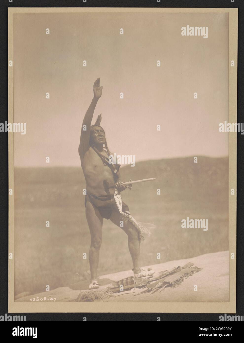 Invocation-Sioux, c1907. Photographs shows a Dakota man, wearing ...