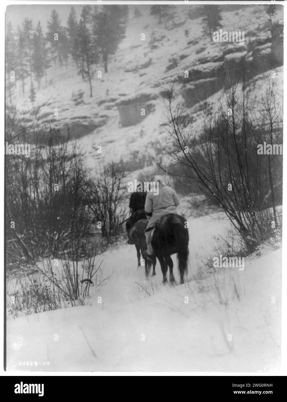 Winter hunter[s]-Apsaroke, c1908. Two Apsaroke men on horseback riding ...