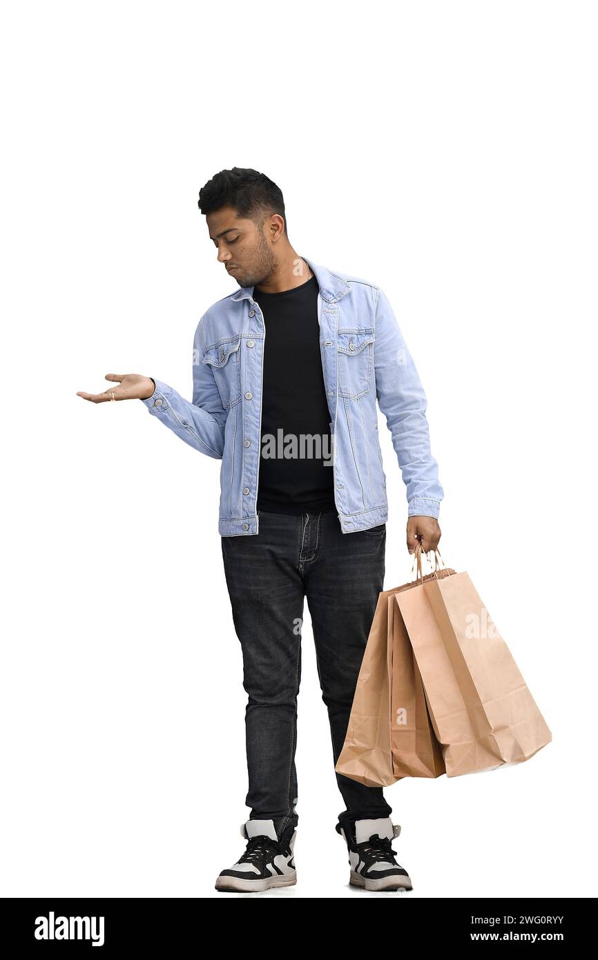 Man on a white background with shoppers point side Stock Photo - Alamy