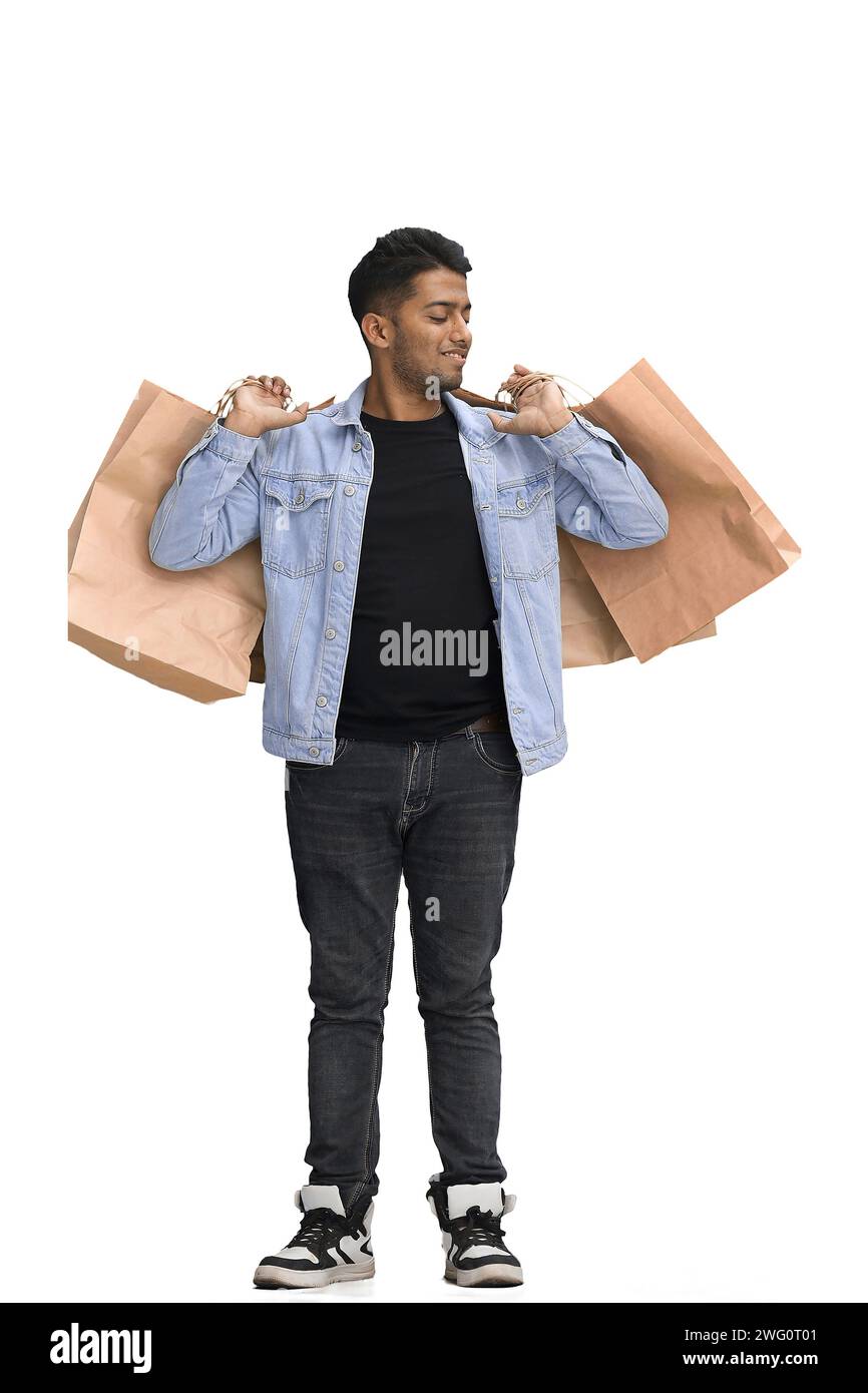 Man on a white background with shoppers Stock Photo - Alamy