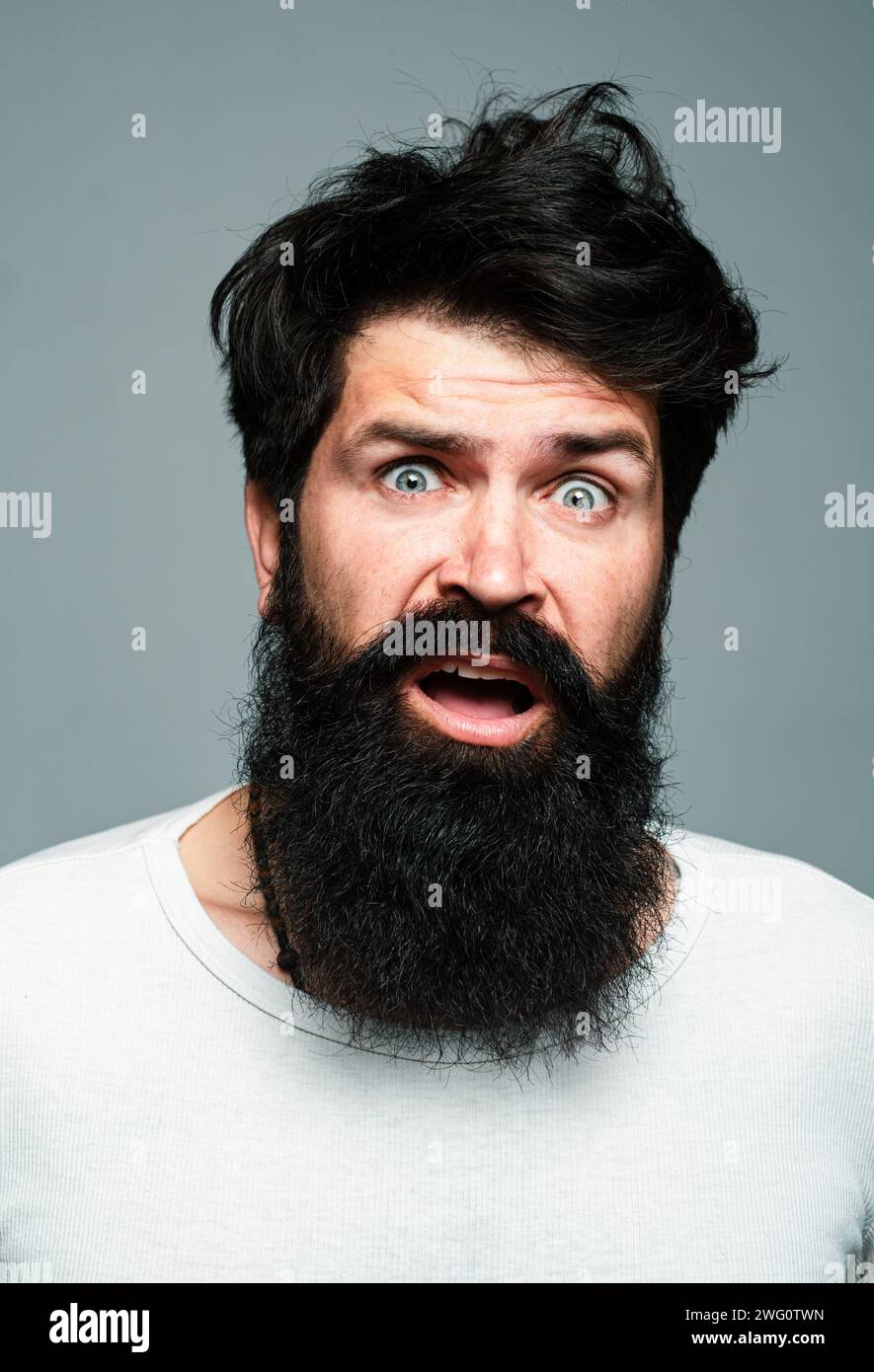 Surprised handsome man. Shocked male model with surprise expression ...