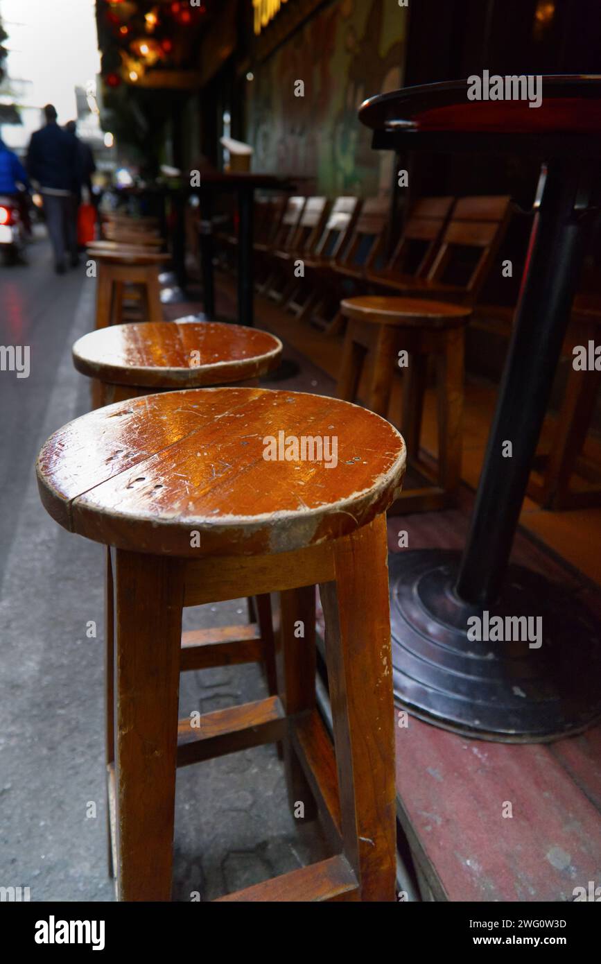 Stools await customers on the food street in Hanoi, Vietnam Stock Photo ...