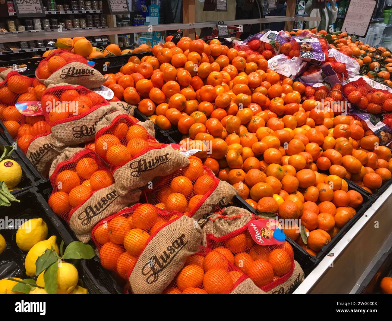 Mandarin orange fruits for sale at the supermarket with one fruit ...