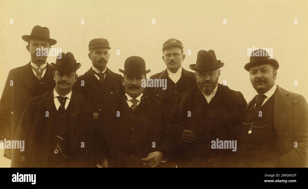 Seven men, half-length portrait, facing front,1894 or 1895. In album ...