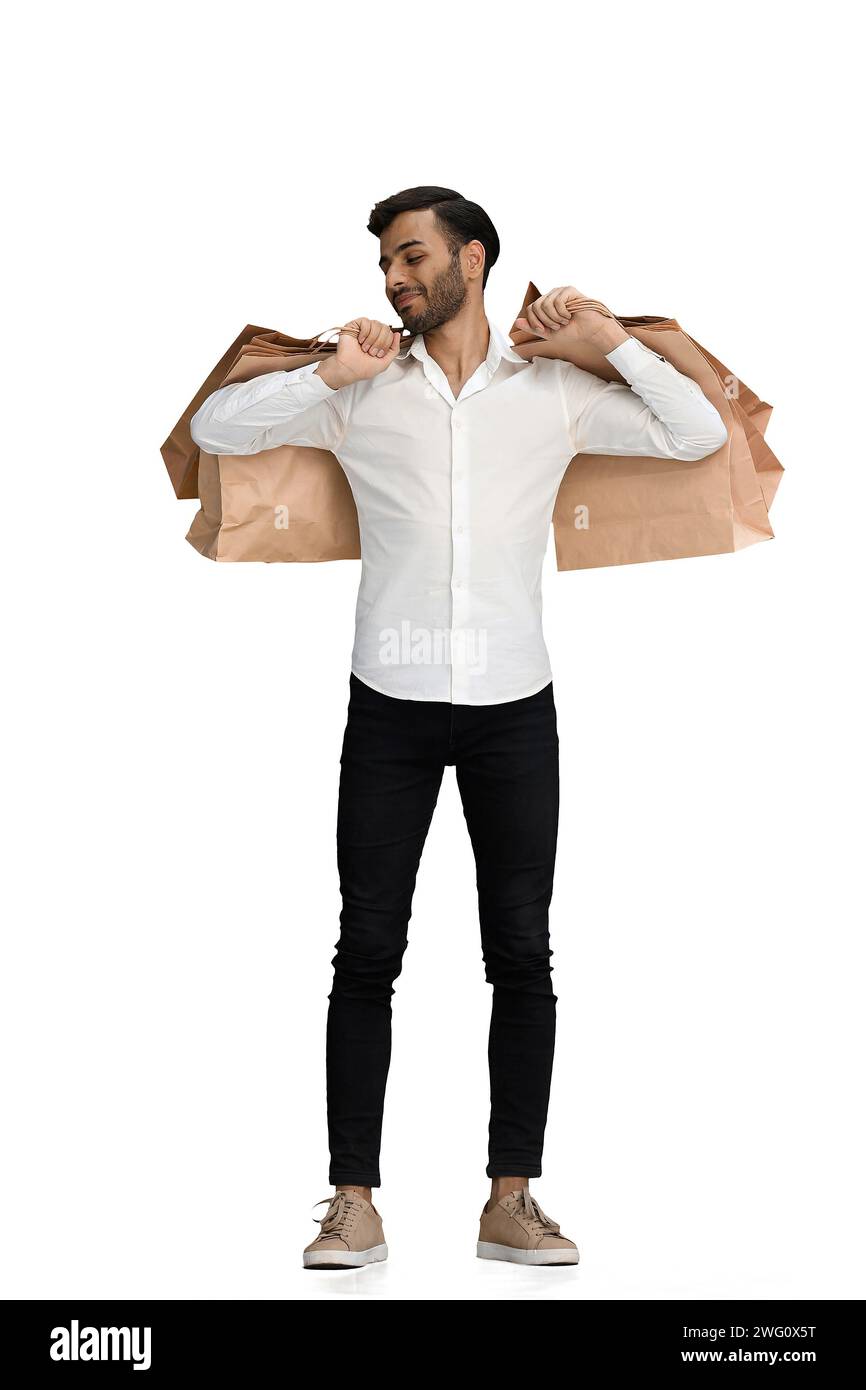 Man on a white background with shoppers Stock Photo - Alamy