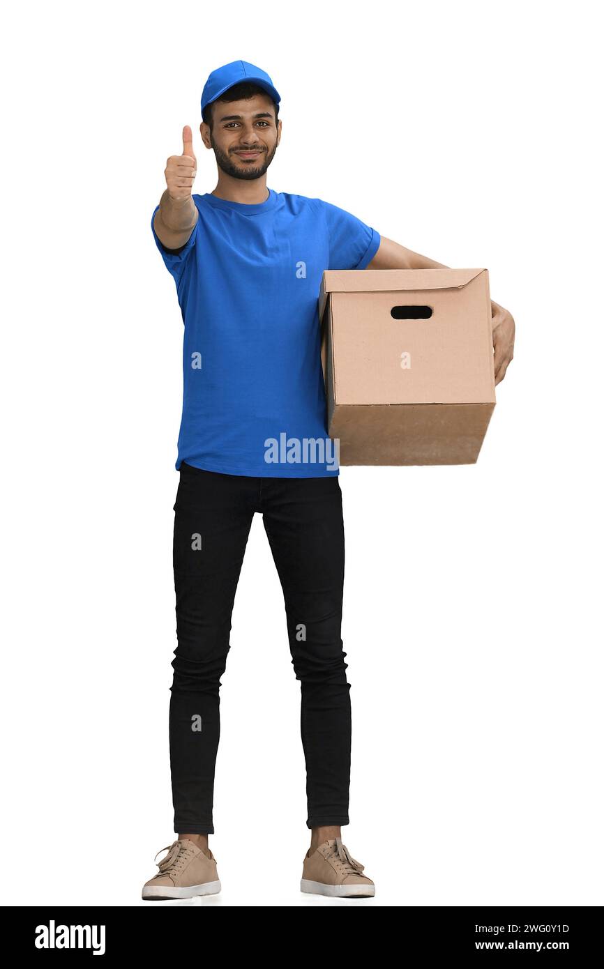 A man on a white background with box. Shows thumbs up sign Stock Photo ...
