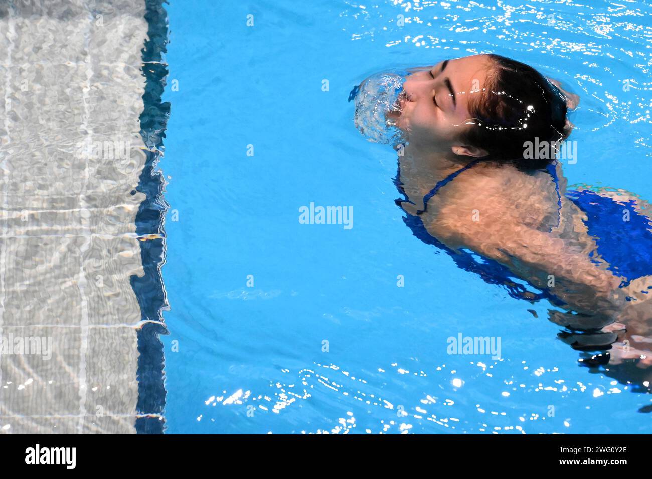 Maha Amer of Egypt reacts after competeing in the diving 1m preliminary ...
