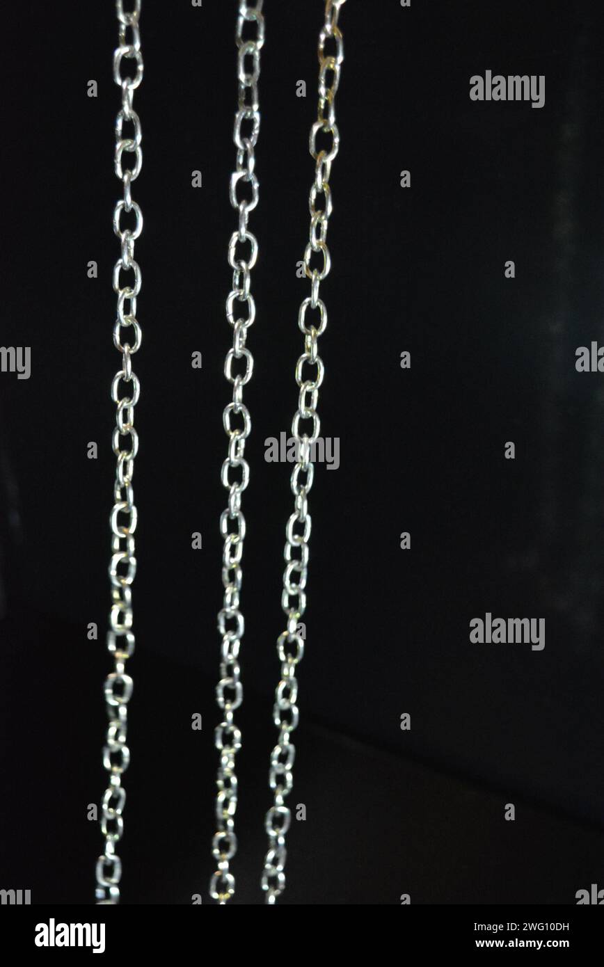 Home furnishings, metal chains of different types and styles arranged ...