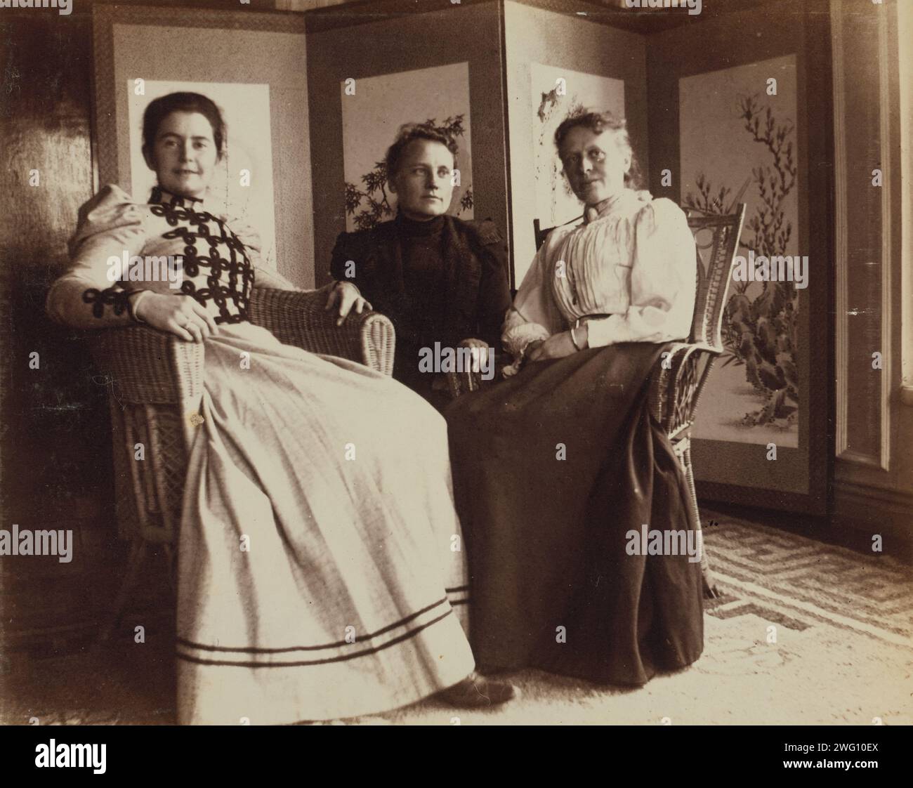 Three friends seated in the veranda room, Dom Smith, Vladivostok ...