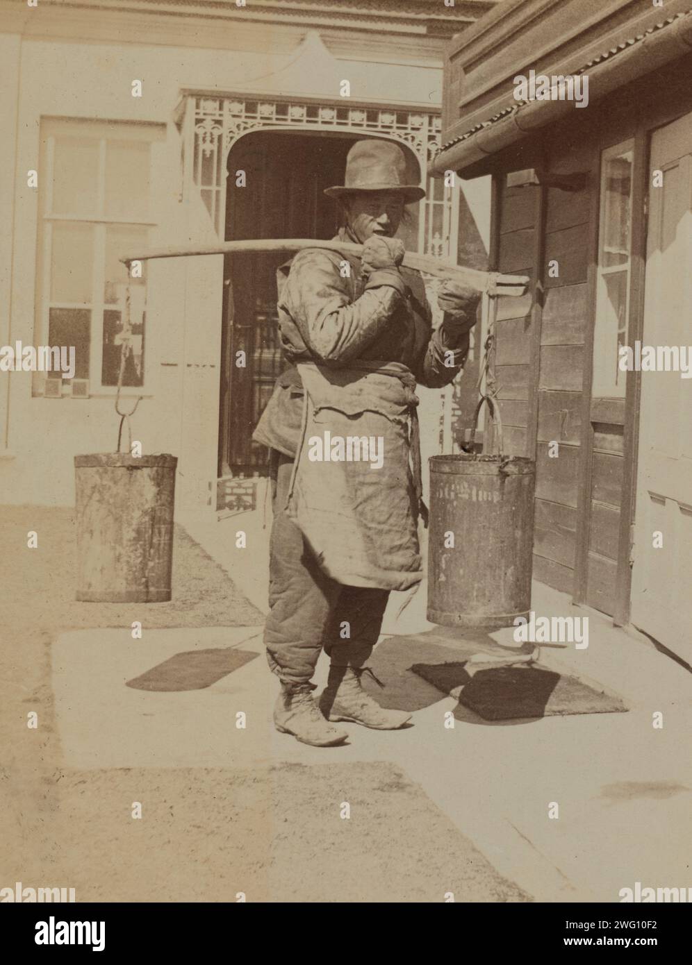 Dou Kee, one of the Chinese servants, carrying water buckets, Dom Smith ...
