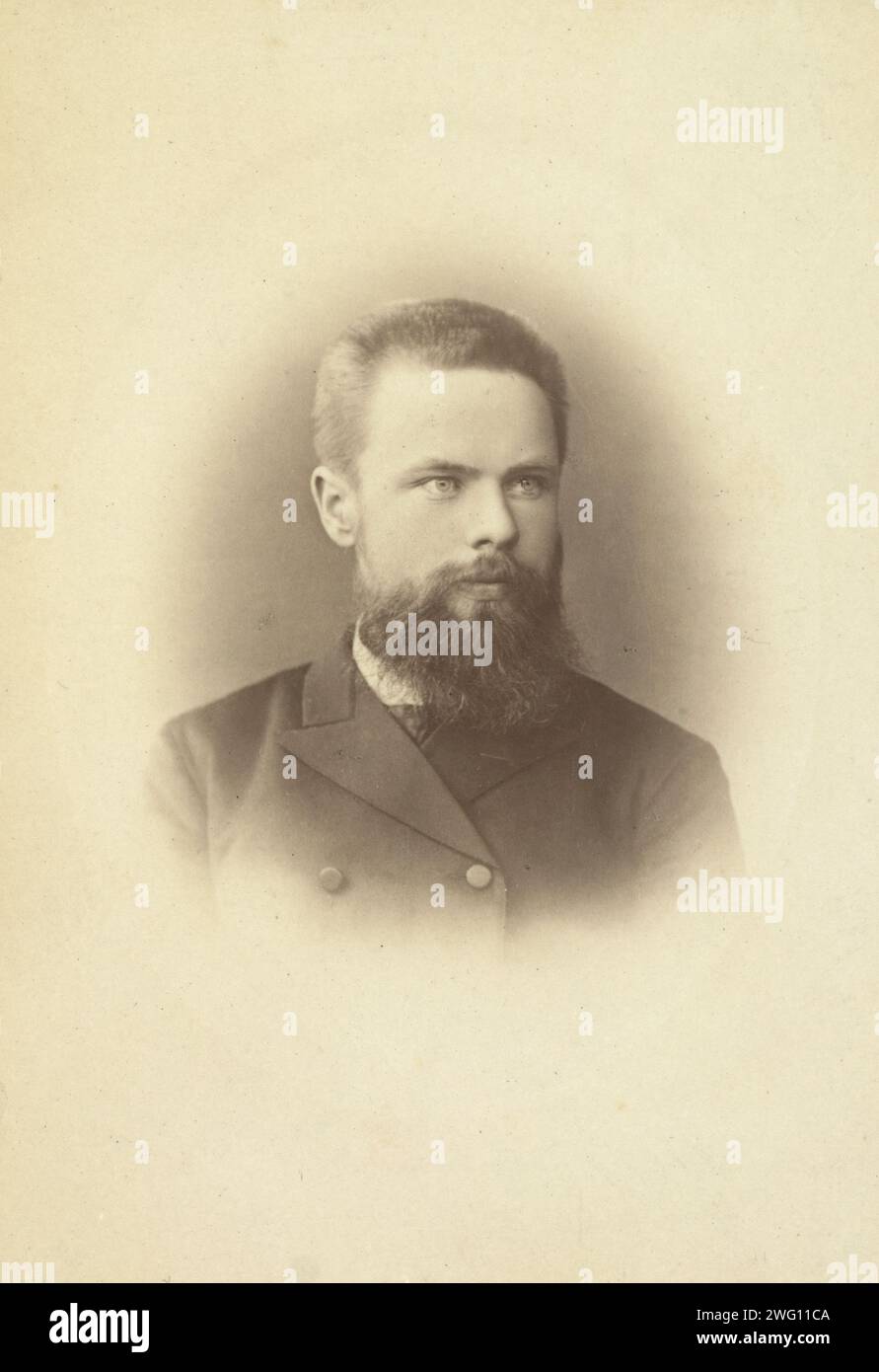 K Mikhailov, head-and-shoulders portrait, facing slightly right ...