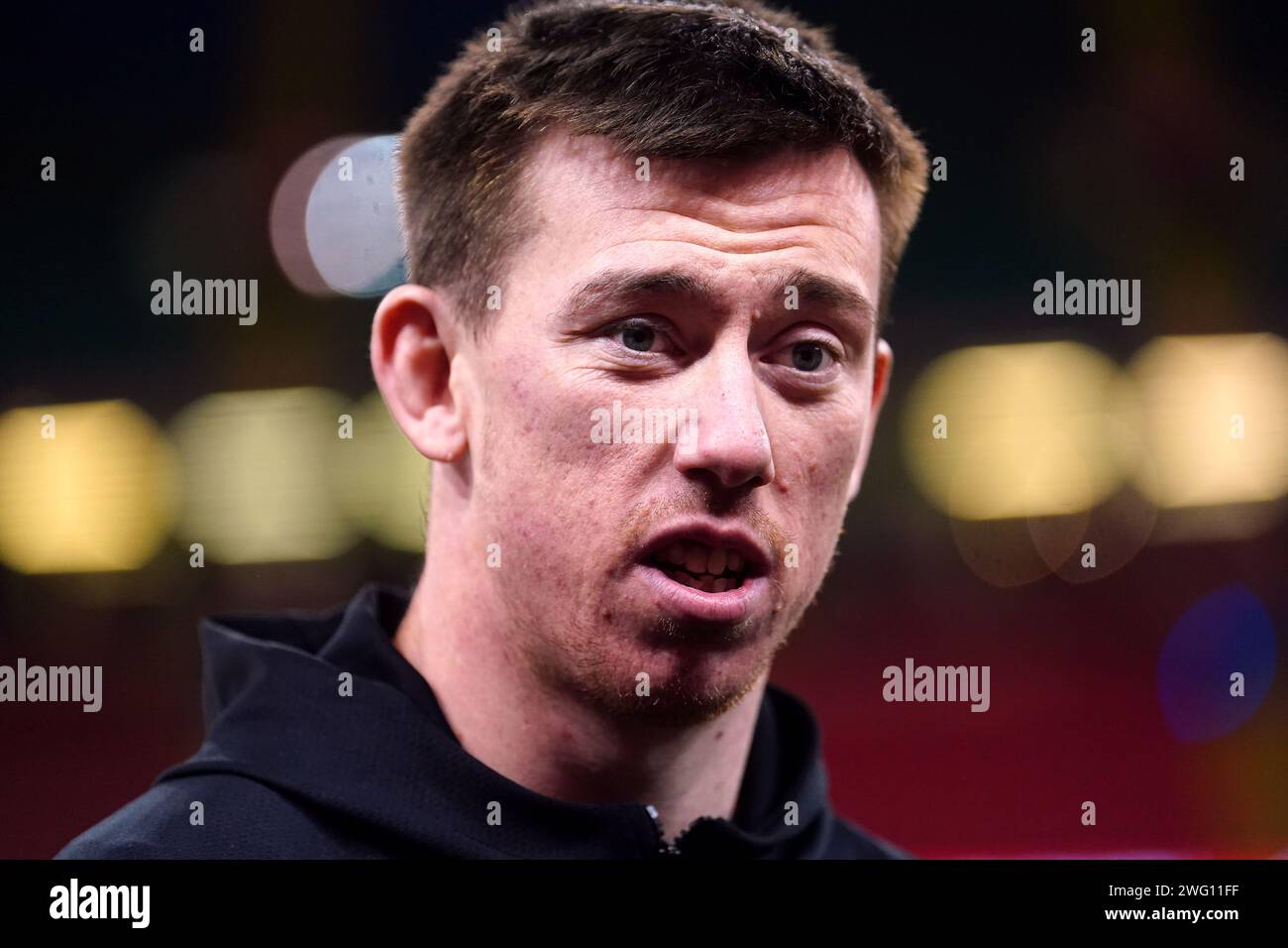 Wales' Adam Beard is interviewed during a team run at the Principality ...