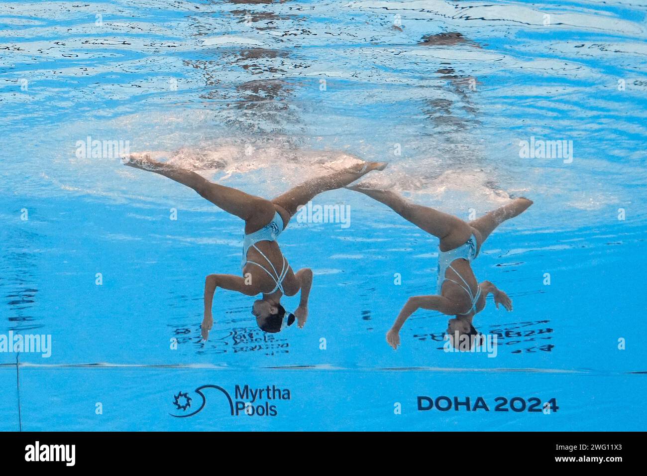 Mikayla Morales Sequera and Kyra Hoevertsz, of Aruba, compete in the ...
