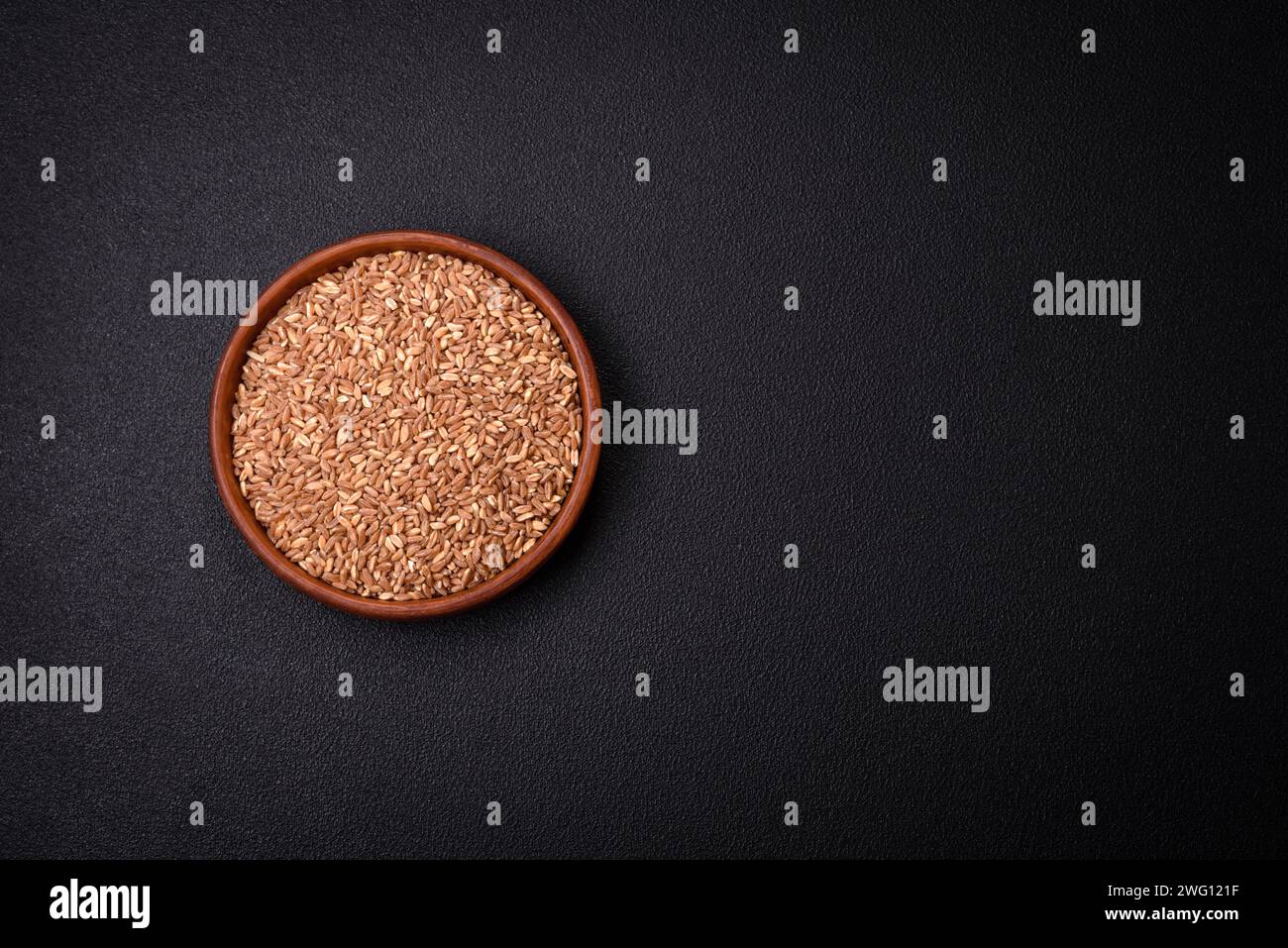 Large grains of wheat porridge are brown in color when raw. Cooking ...