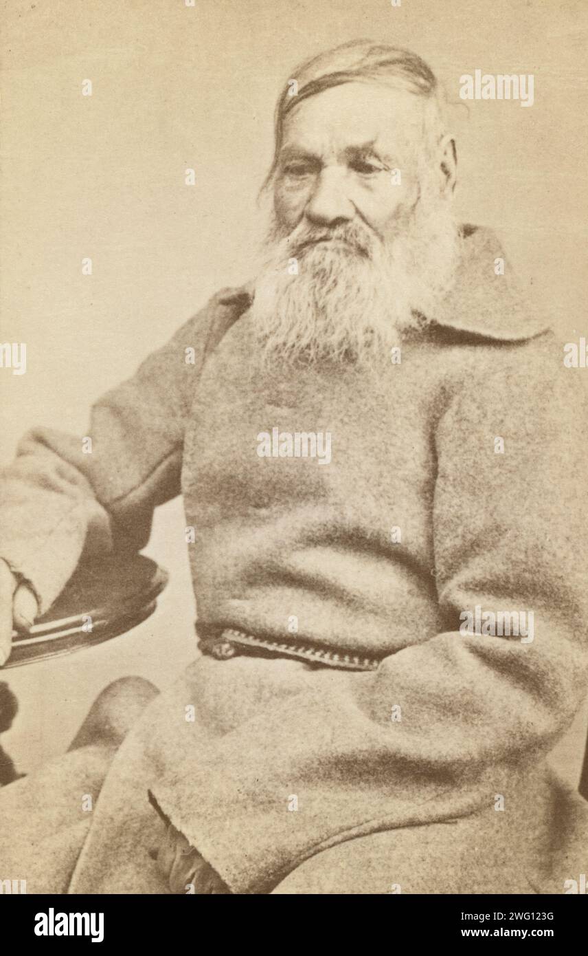 Three-quarter length portrait of an elderly convict, facing slightly ...