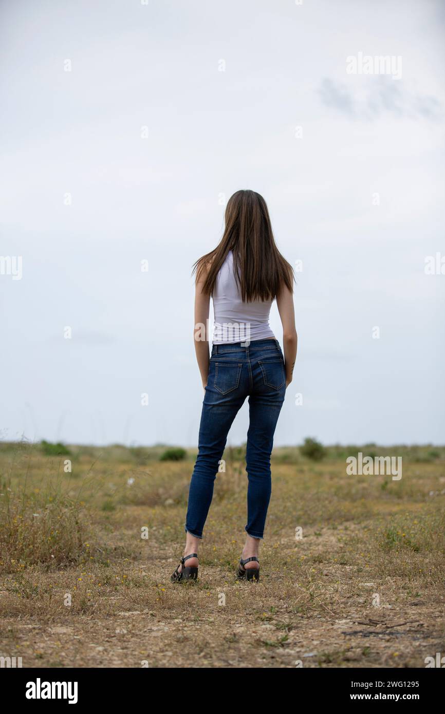 Teen standing tall girl hi-res stock photography and images - Alamy