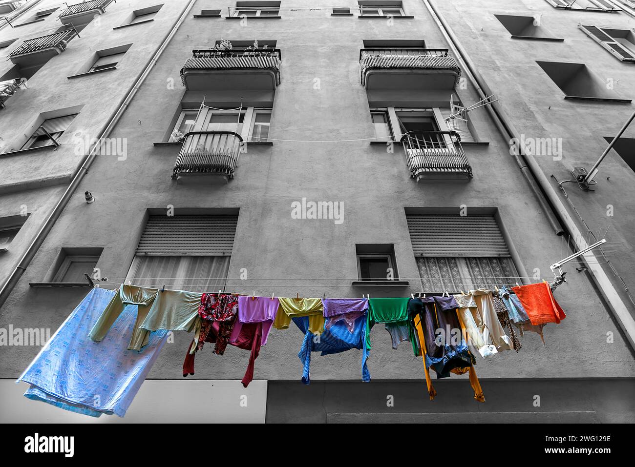 Laundry on the line at a residential tower block in the historic city ...