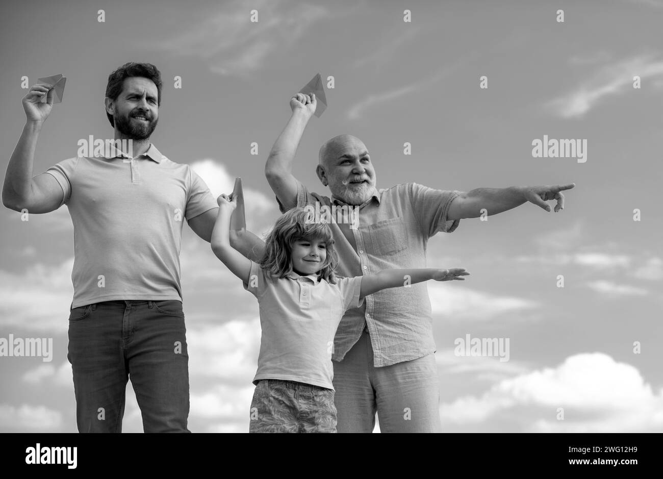 Fathers day. Kid having fun with toy plane. Men generation family with ...