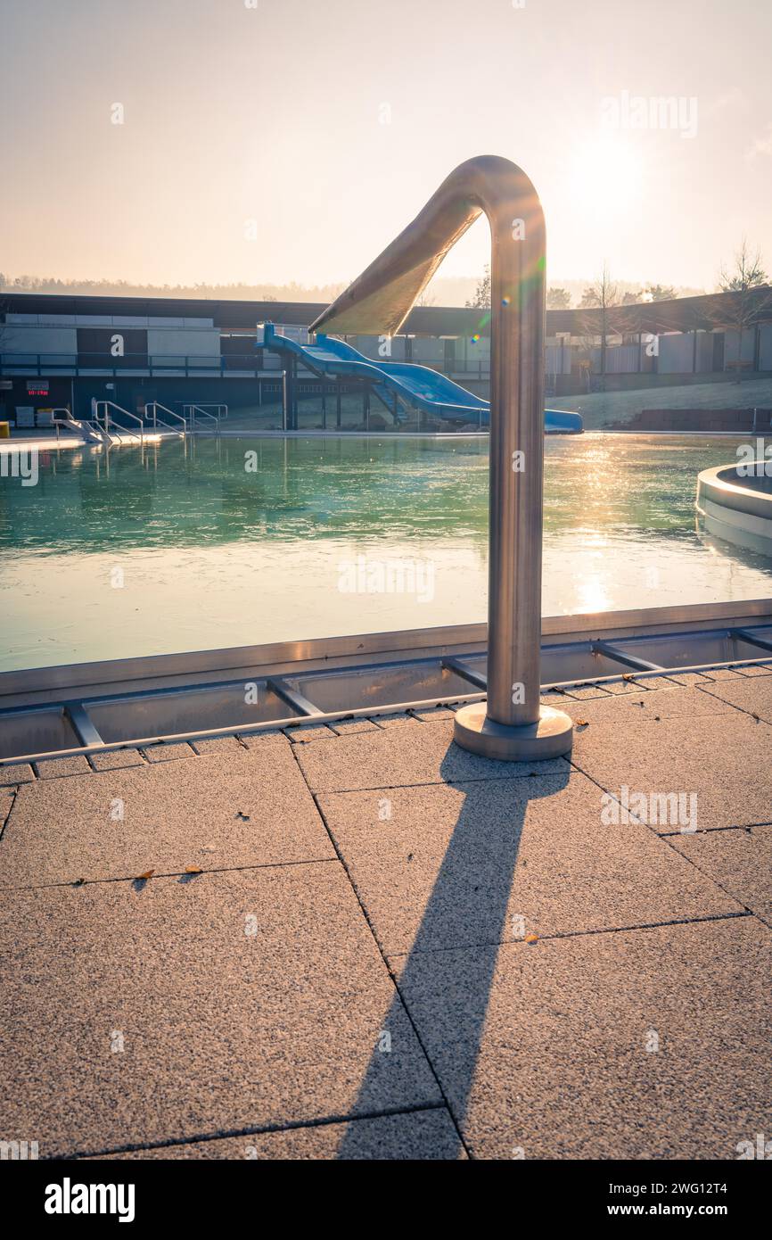 Outdoor pool with an outdoor shower in the shining sunlight, ENCW ...