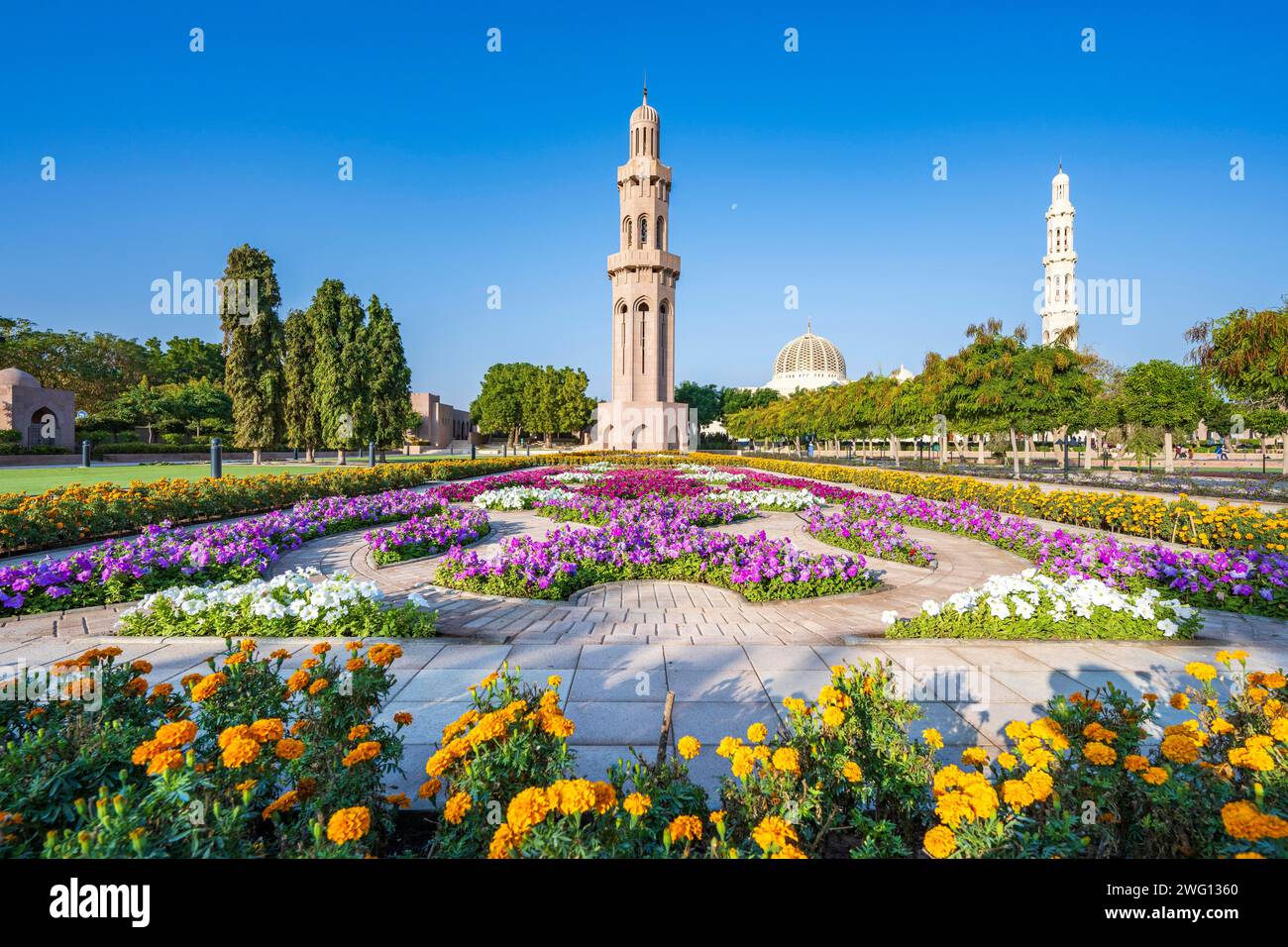 Sultan Qaboos Grand Mosque, blooming flowers in gardens, Muscat, Oman ...