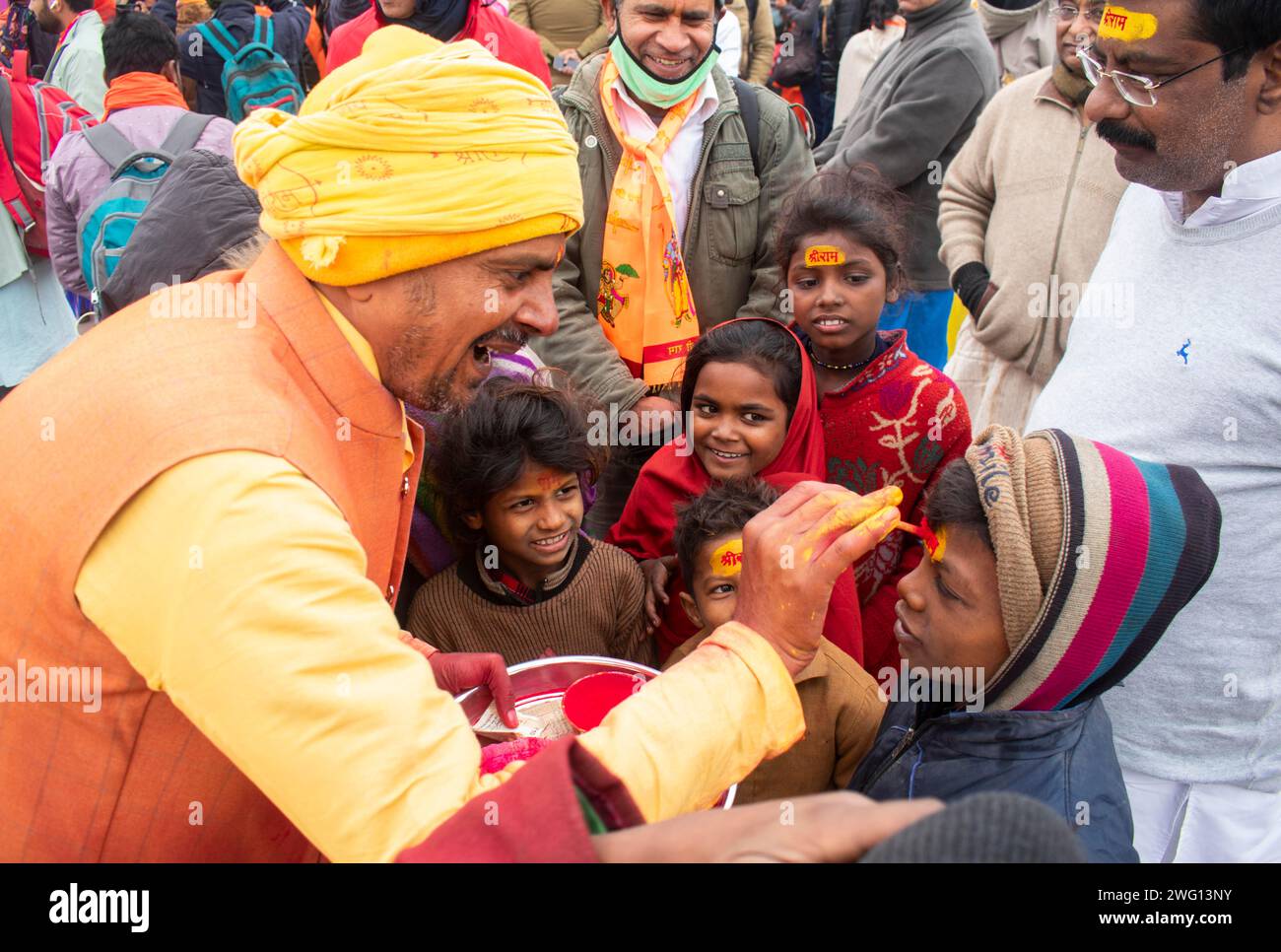 Children get painted the name of Lord Ram on their forehead, on the eve ...