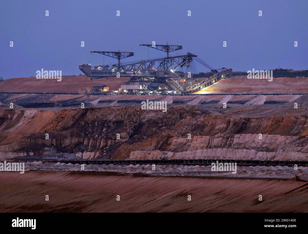 Lignite excavators extract coal in the Welzow open-cast mine, operated ...