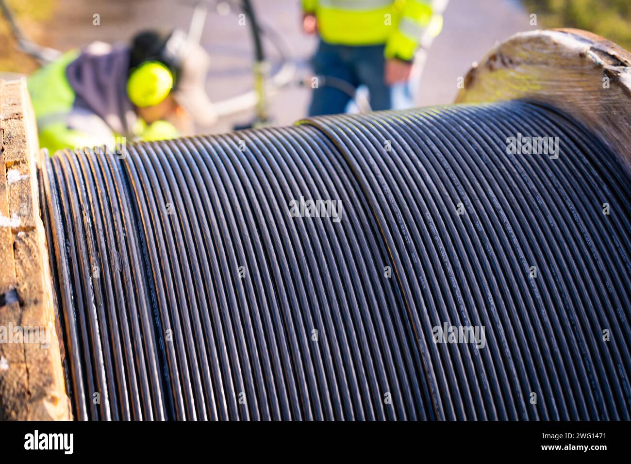 Detailed view of the cable spool on a machine reel with focus on the ...