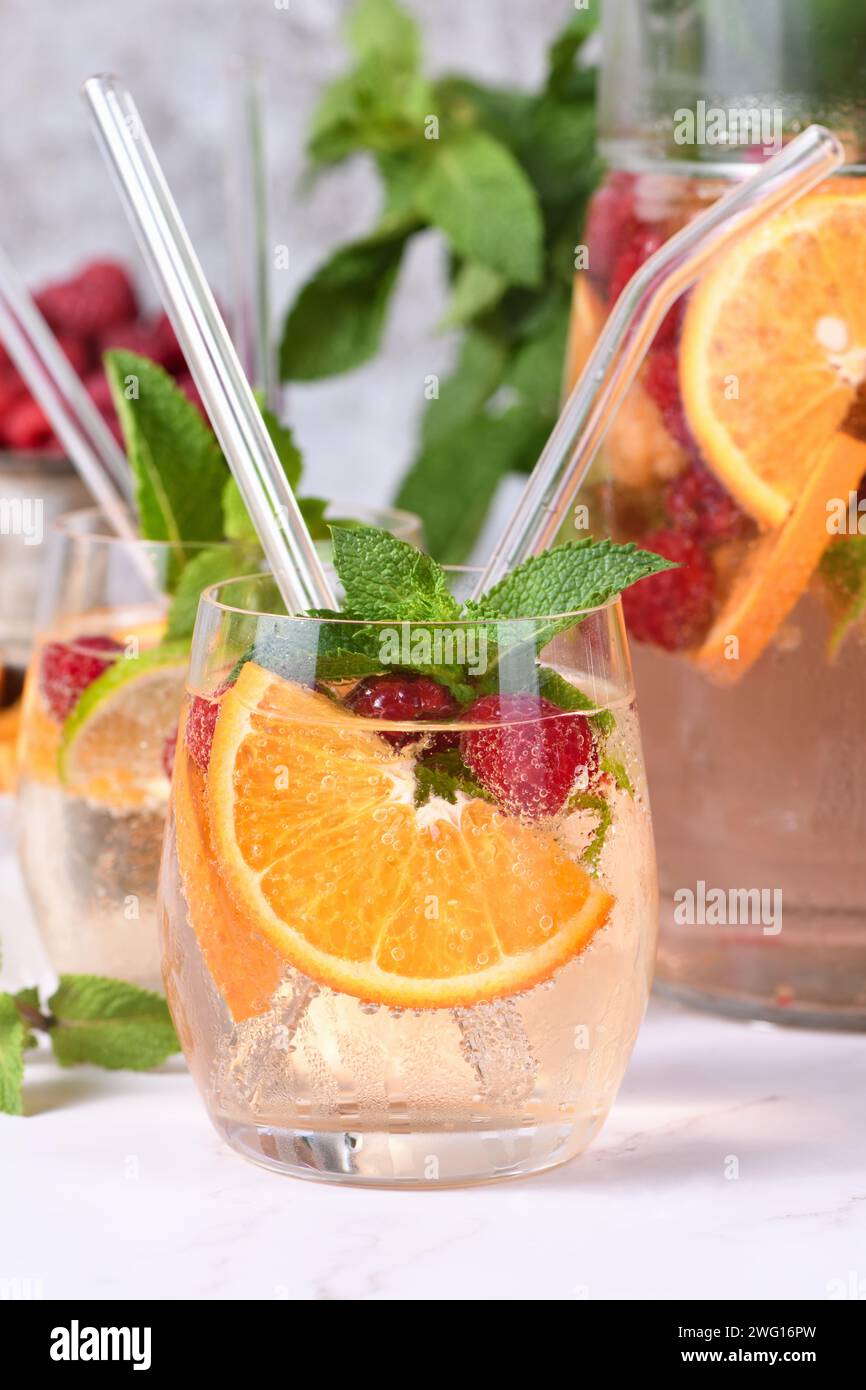 Summer Sangria cocktail or lemonade with raspberry, orange and mint ...