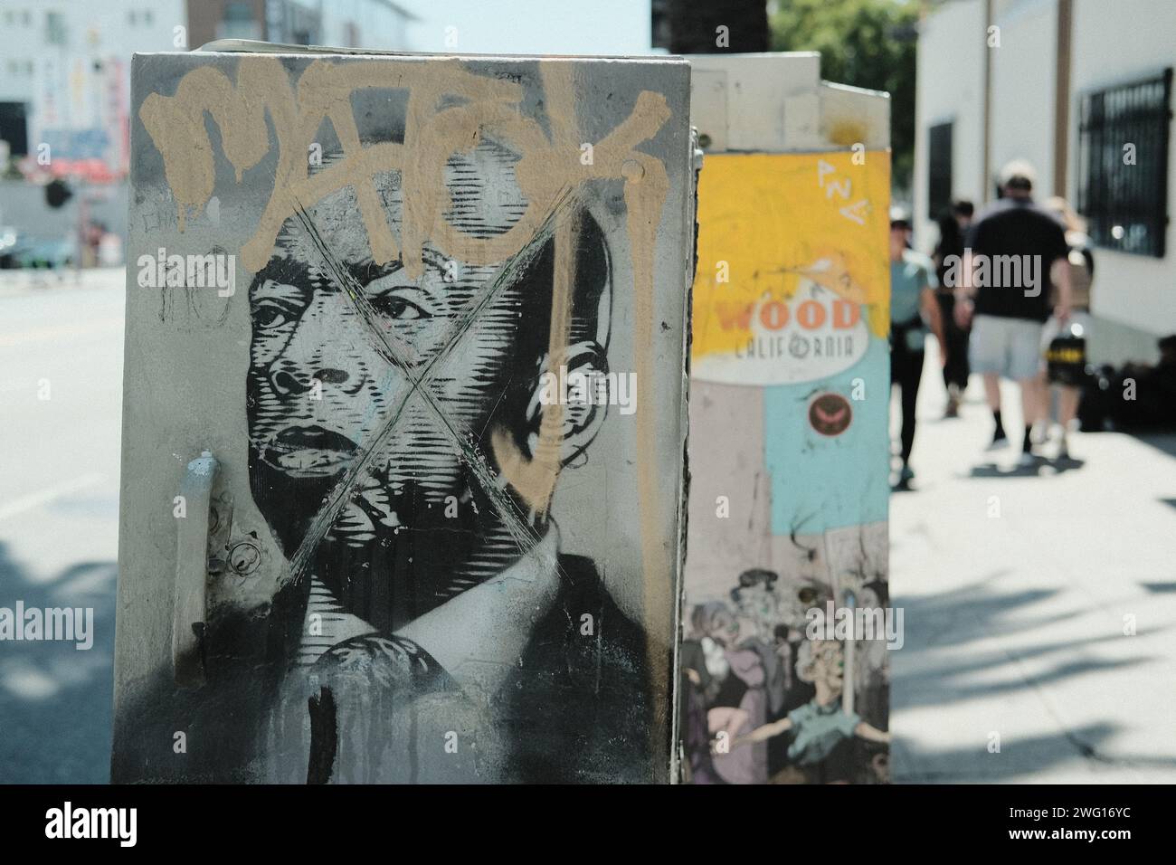 Black man with cross graffiti in Los Angeles Stock Photo - Alamy