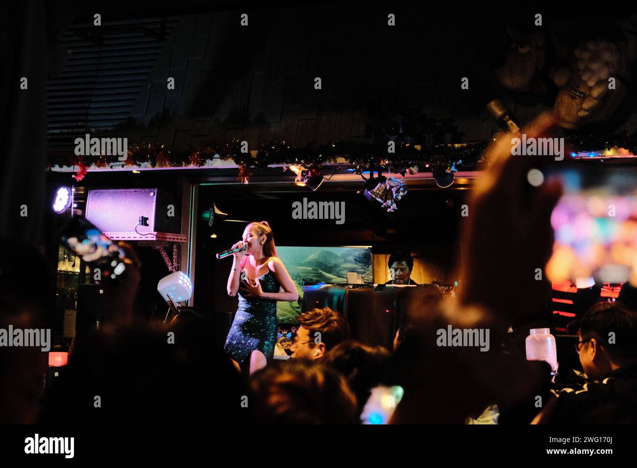A live performance in a bar in Hong Kong Stock Photo - Alamy