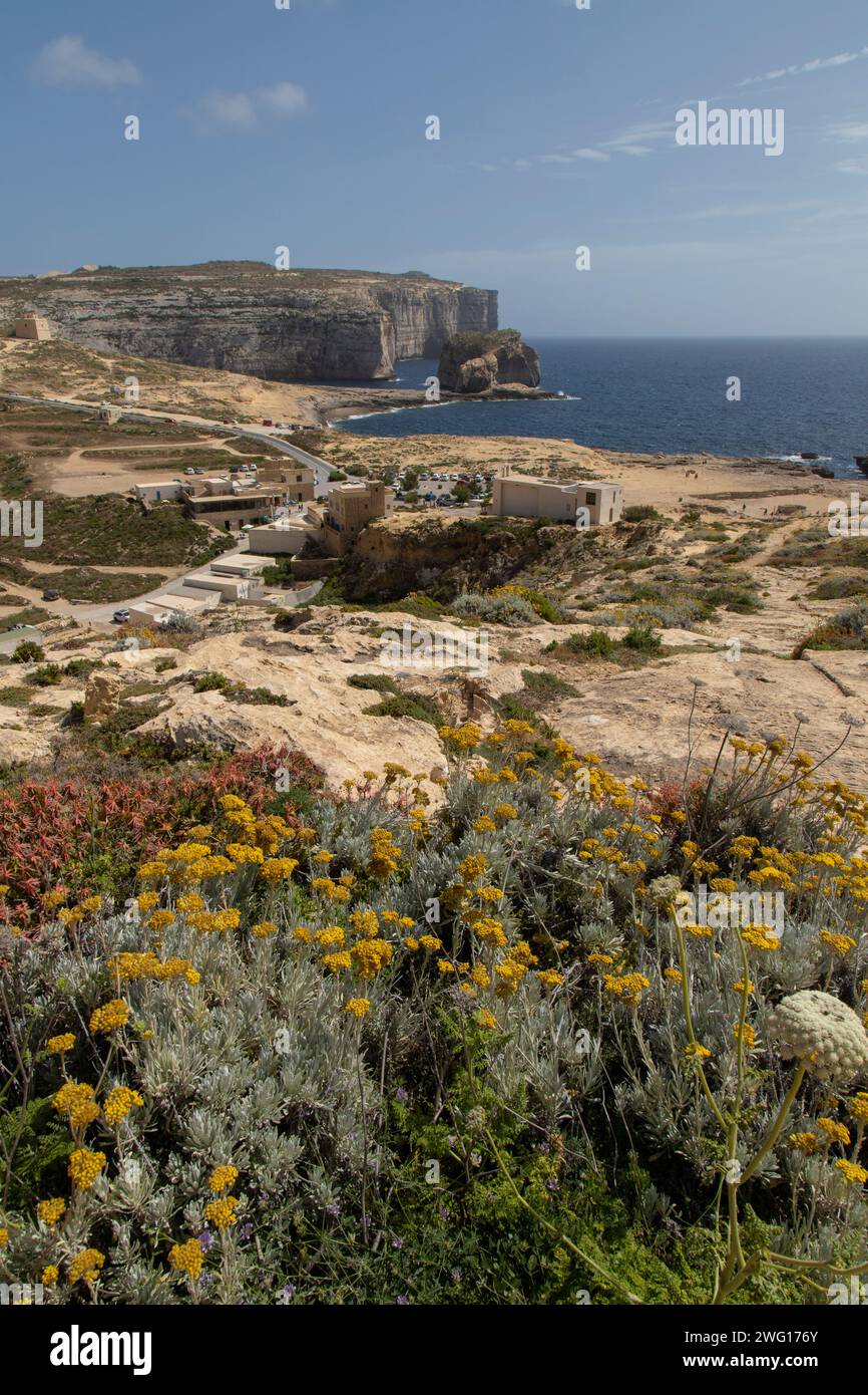 A beautiful shot of stunning rocky landscape surrounding Dwejra Bay ...