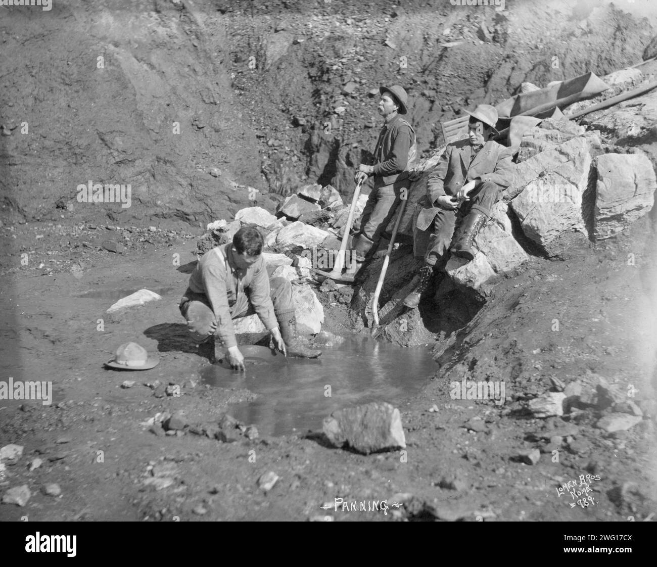 Panning gold Black and White Stock Photos & Images - Alamy