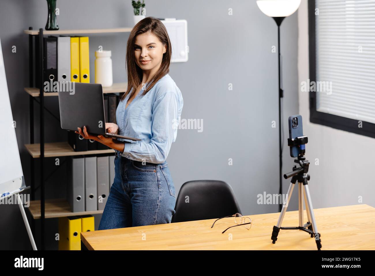 Students filming with smartphone hi-res stock photography and images ...