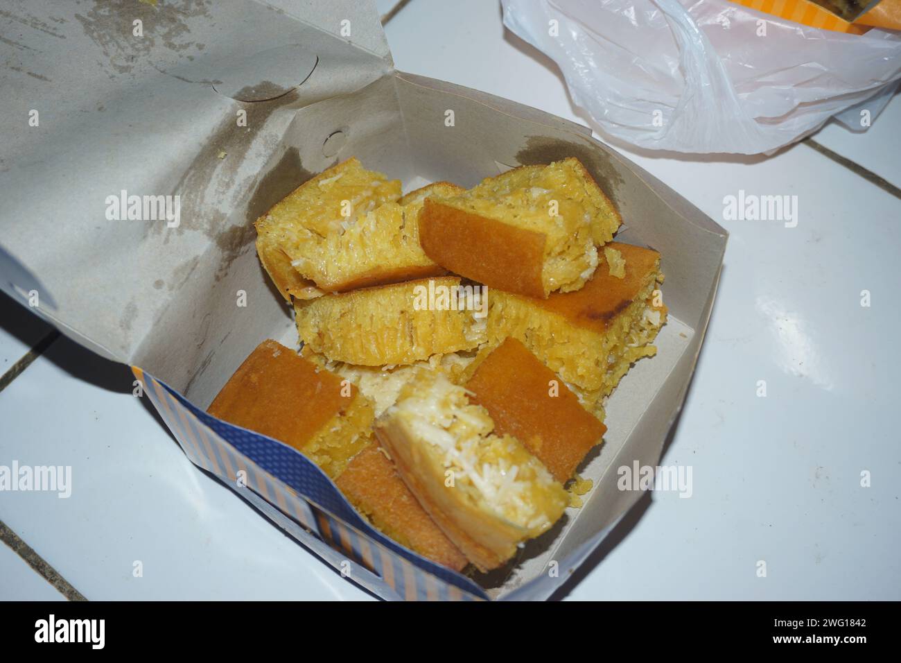 Photo of cheese banana martabak in a box, a typical Indonesian snack ...